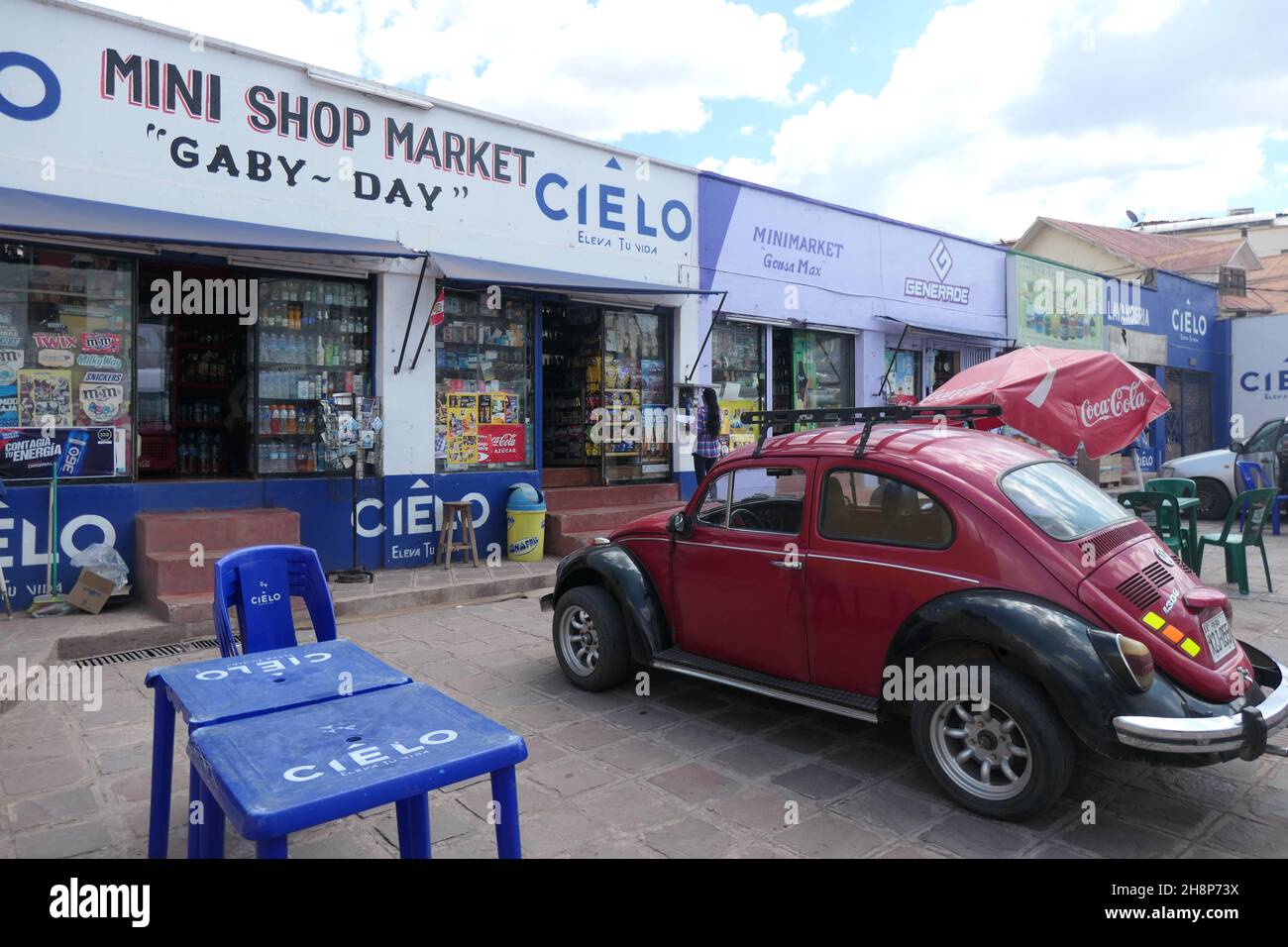 Red Volkswagen beetle car at Mini market shop in Cusco Peru with red ...
