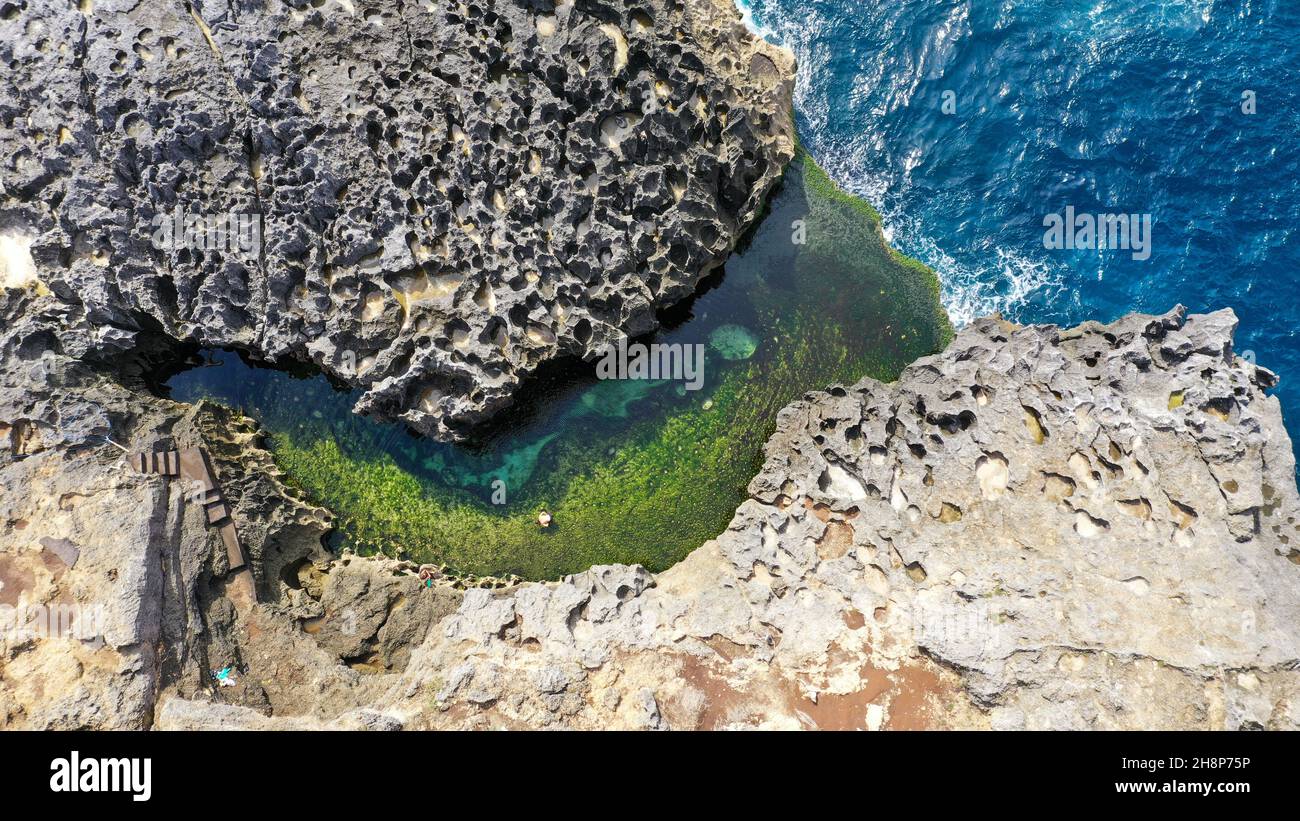 Top down view over natural pool Angels Billabong between rocks in Nusa ...