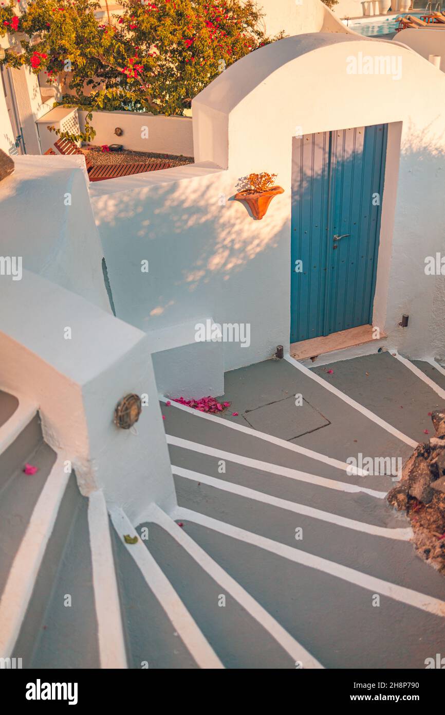 Entrance of a typical White cycladic architecture, house with blue door ...