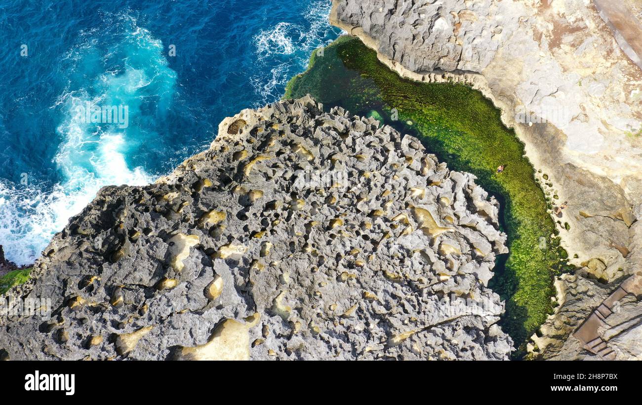 Top down view over natural pool Angels Billabong between rocks in Nusa ...