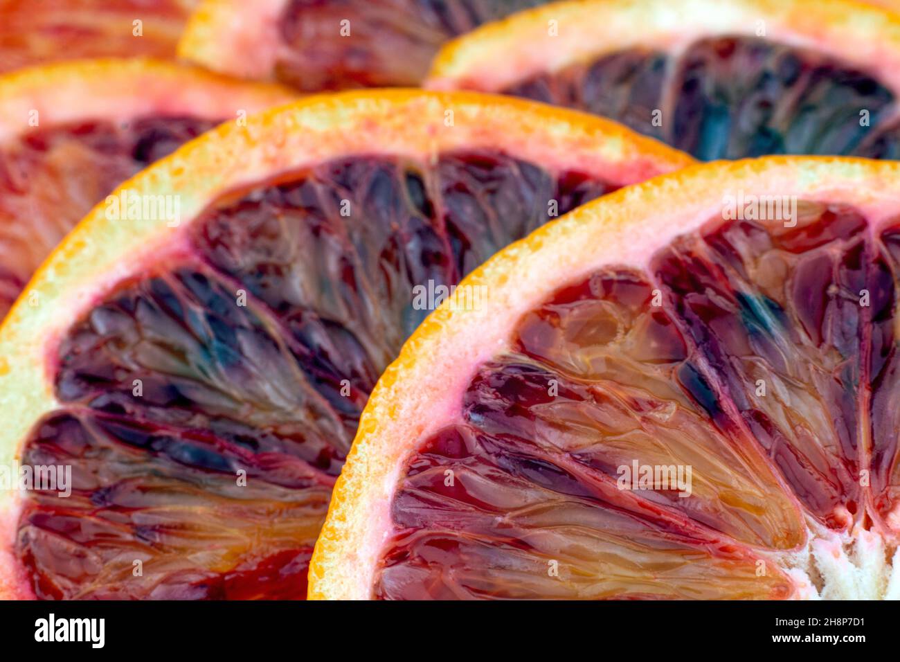 Grapefruits close-up. Slice of blood red ripe grapefruits background ...