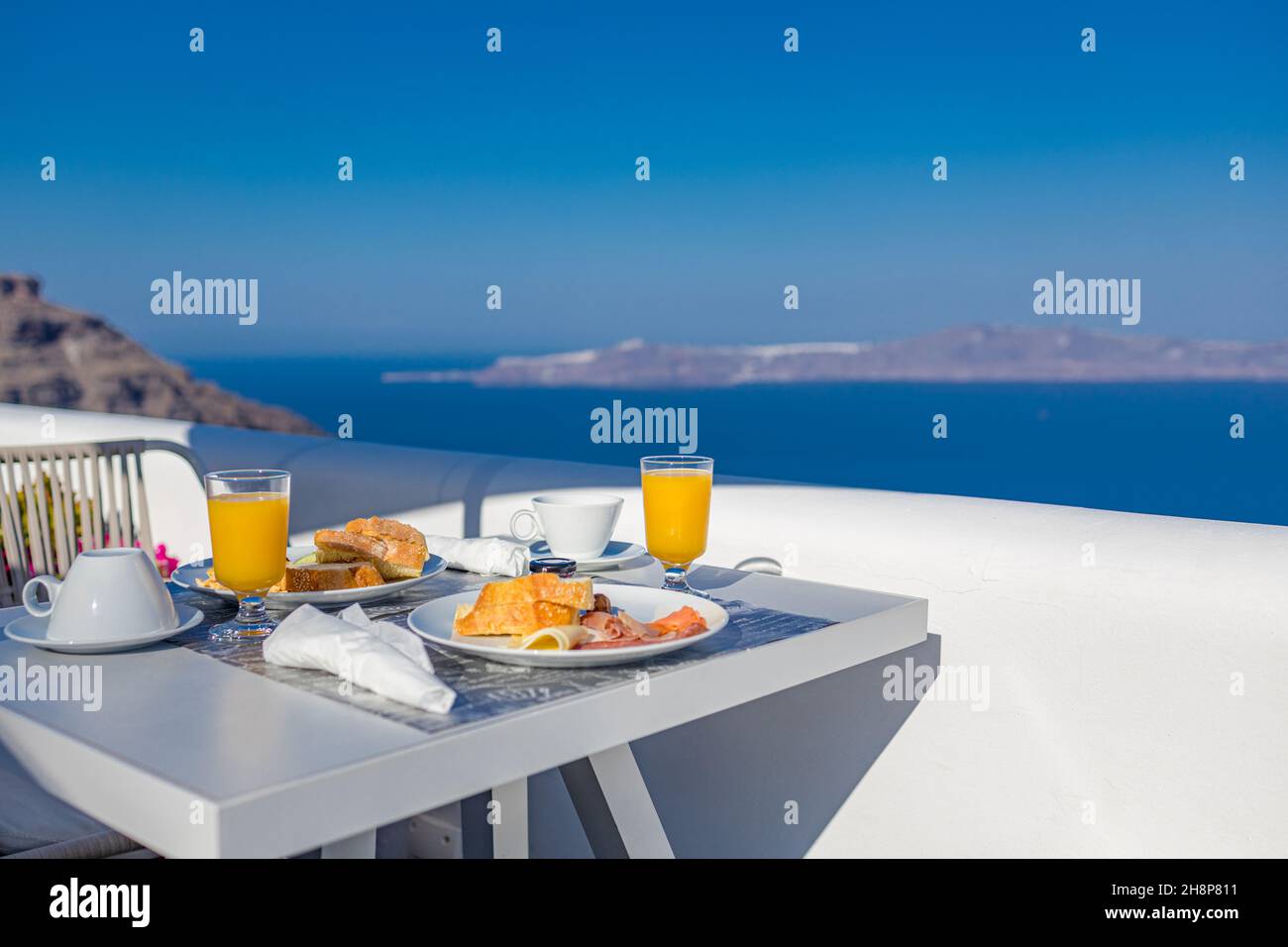 Breakfast table romantic view under idyllic blue sky sea. Perfect ...