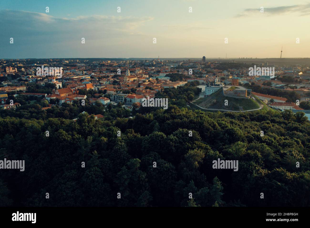 Vilnius Old Town and castle at golden hour Stock Photo - Alamy