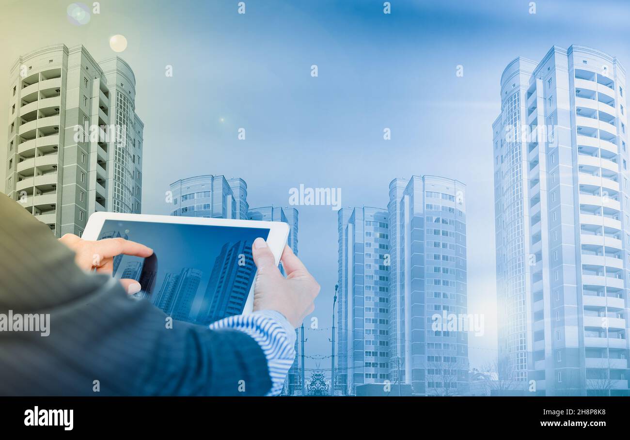 Skyscrapers on screen tablet hi-res stock photography and images - Alamy