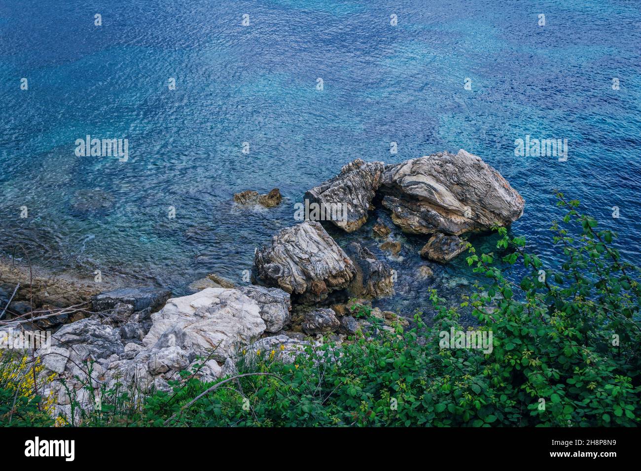Beautiful landscape with sea bay with turquoise water, rocks and cliffs ...