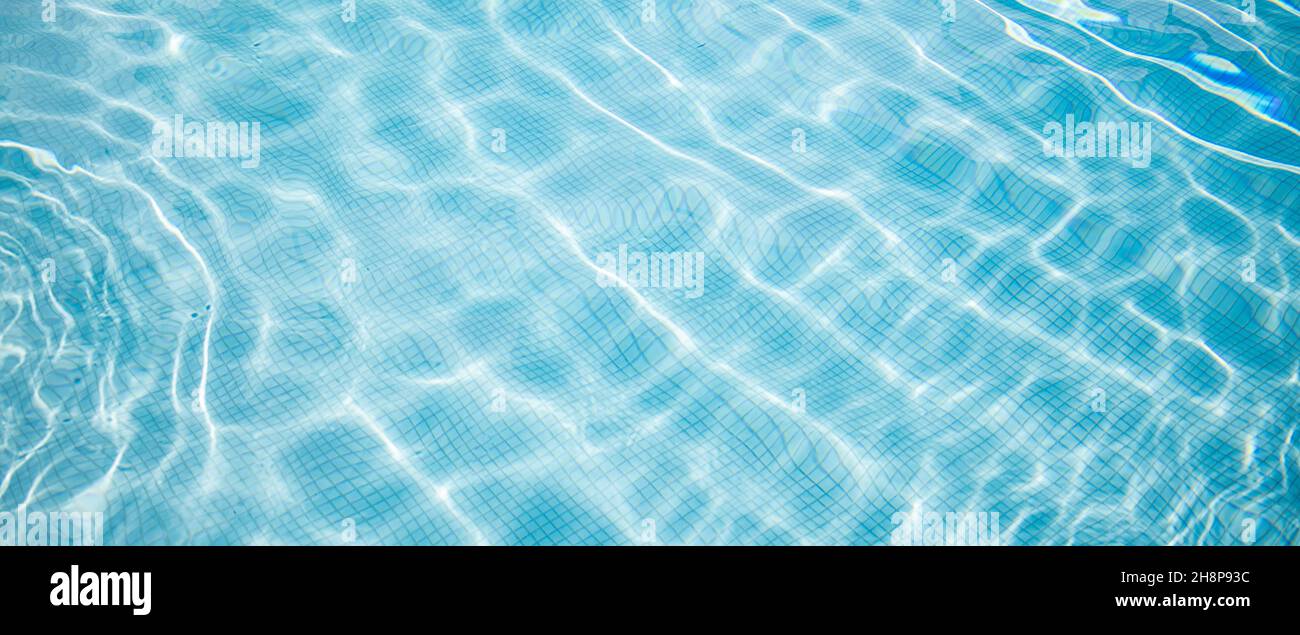 Surface of blue swimming pool. Summer water sport, recreational ...