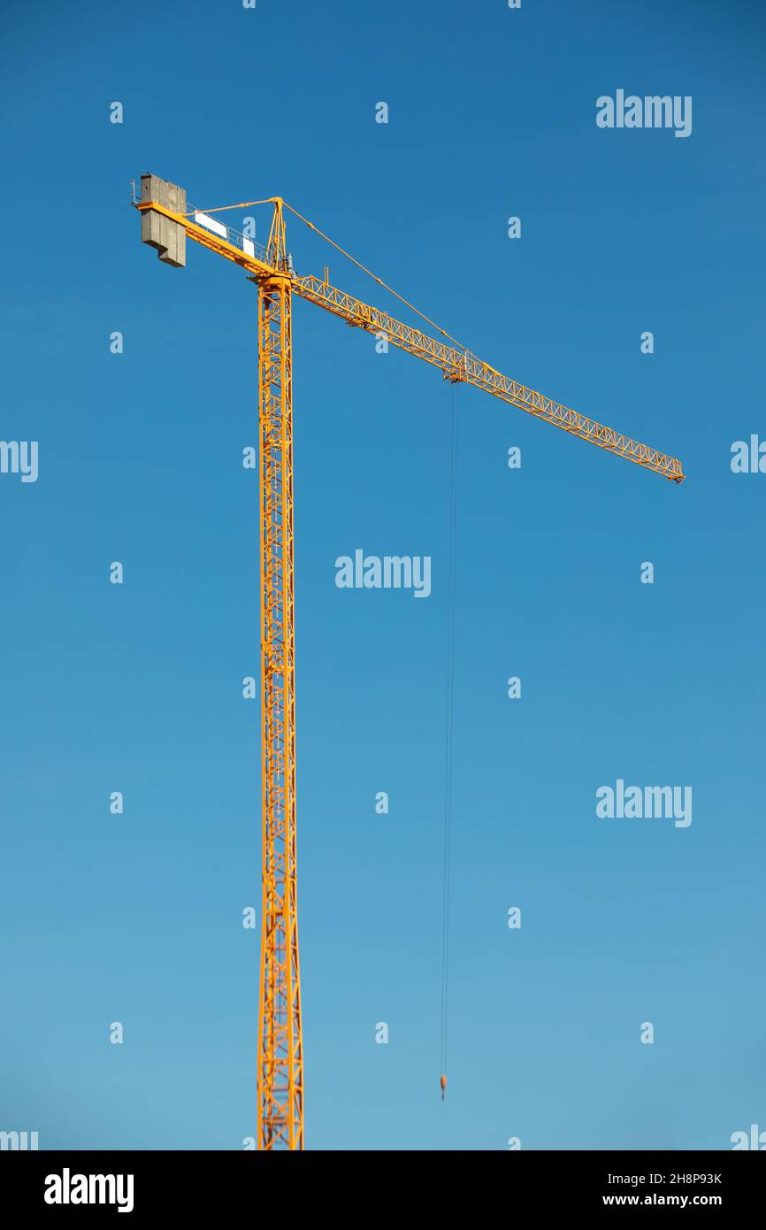 Construction crane on sunny day Stock Photo - Alamy