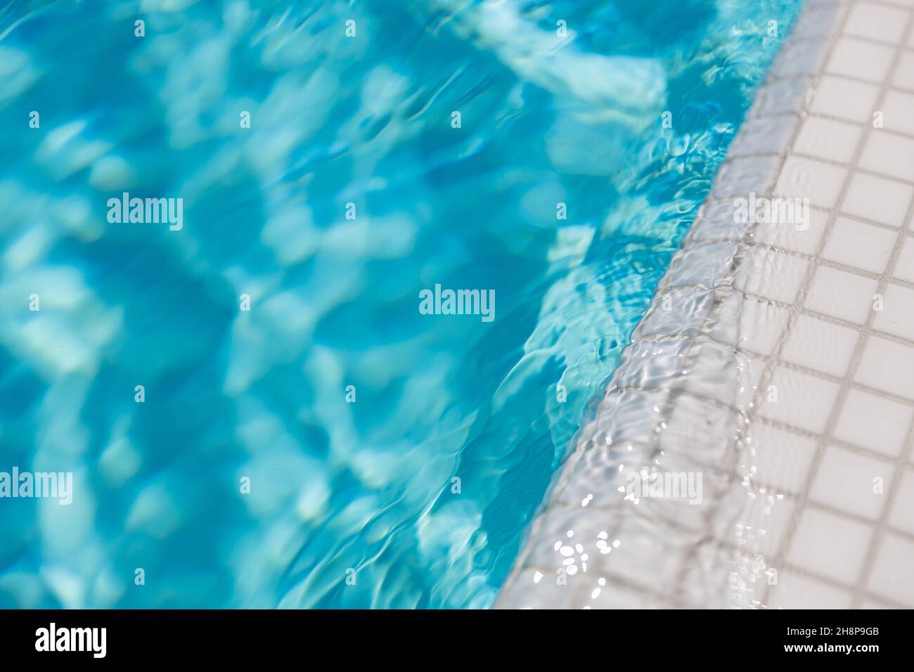 Surface of blue swimming pool. Summer water sport, recreational ...