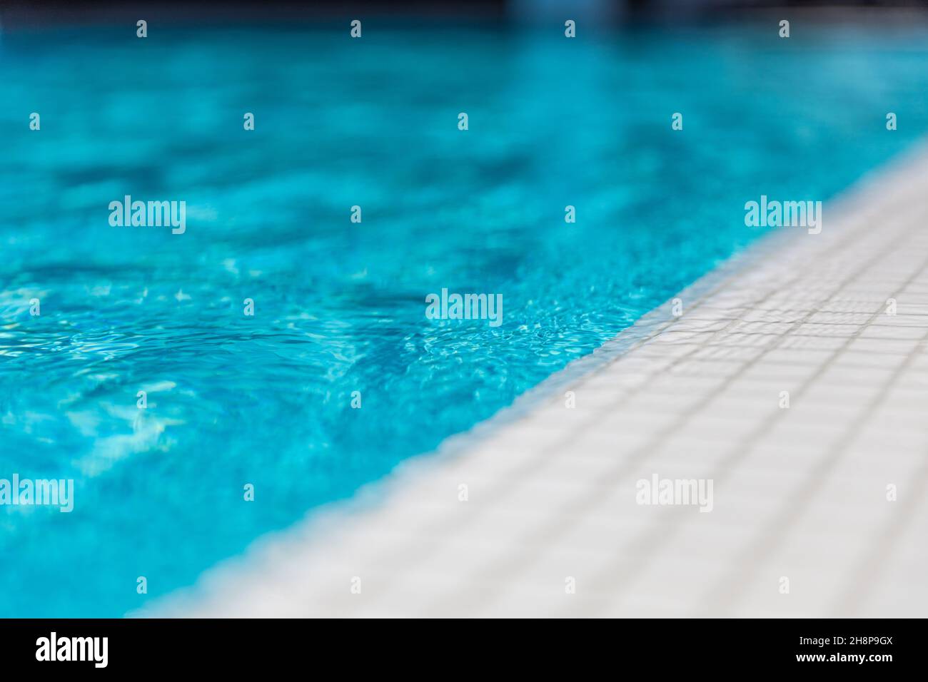 Surface of blue swimming pool. Summer water sport, recreational ...