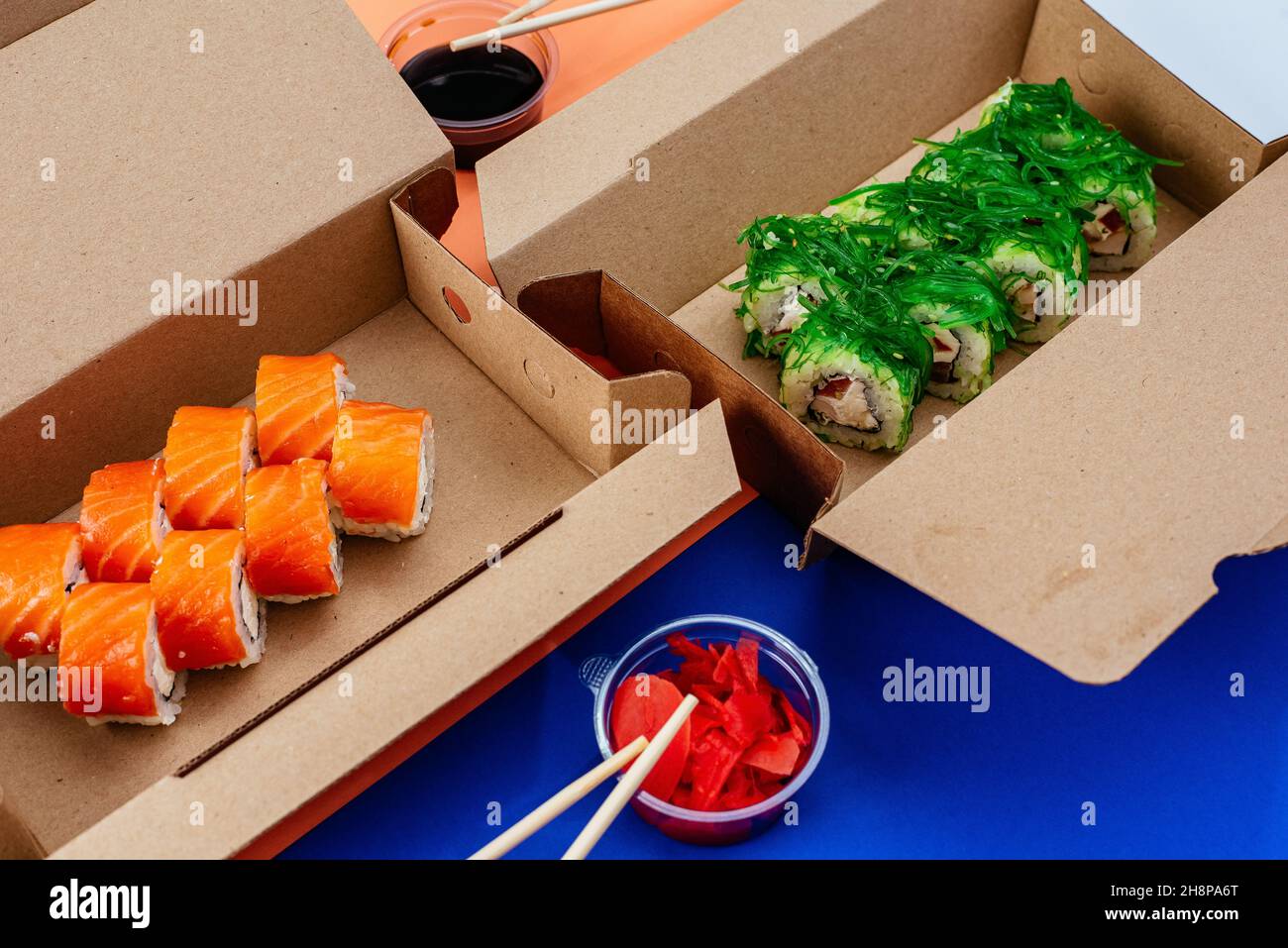 sushi rolls in a disposable container Stock Photo - Alamy