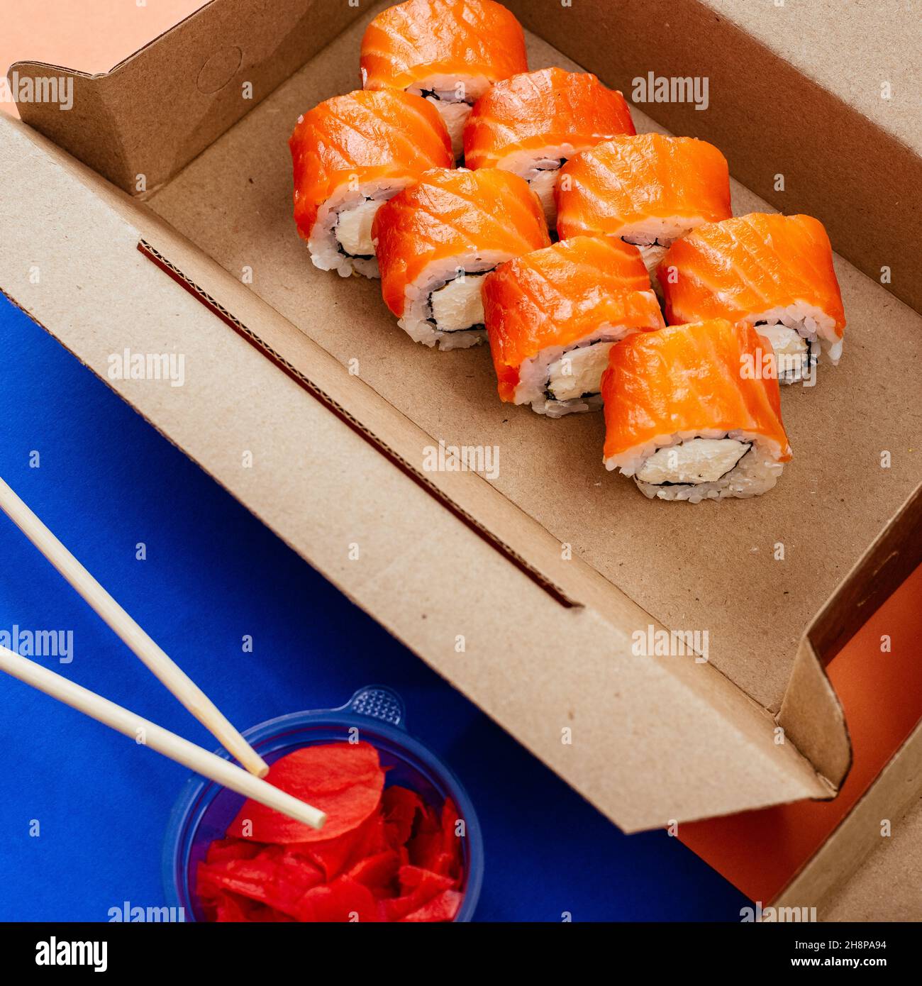 sushi rolls in a disposable container Stock Photo - Alamy