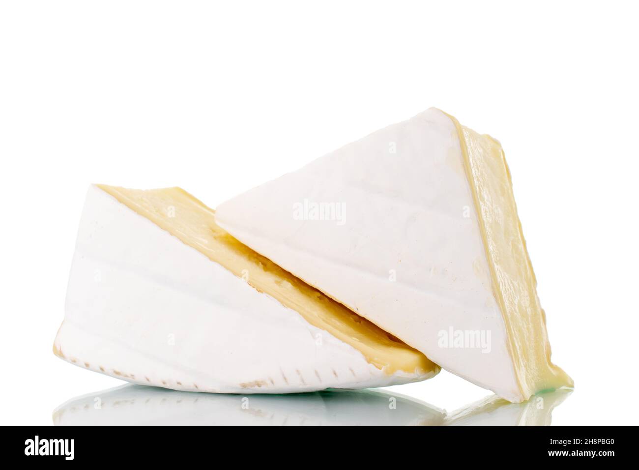 Two fragrant pieces of brie cheese, close-up, isolated on white Stock ...
