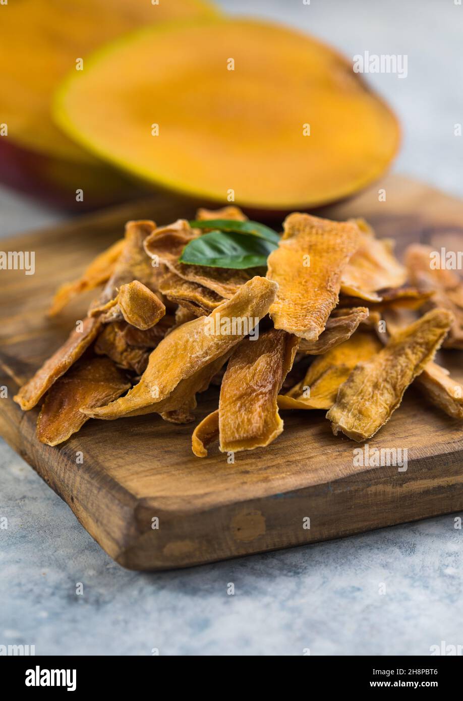 Dried mango background. Candied slices of mango fruit close-up Stock ...