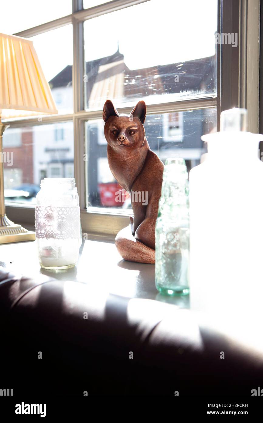 A Fox sits in the window of the Fox and Coney Pub in South Cave,East ...