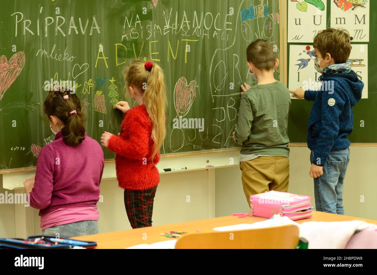 children at school, pupils in the classroom, made angels , angel from ...