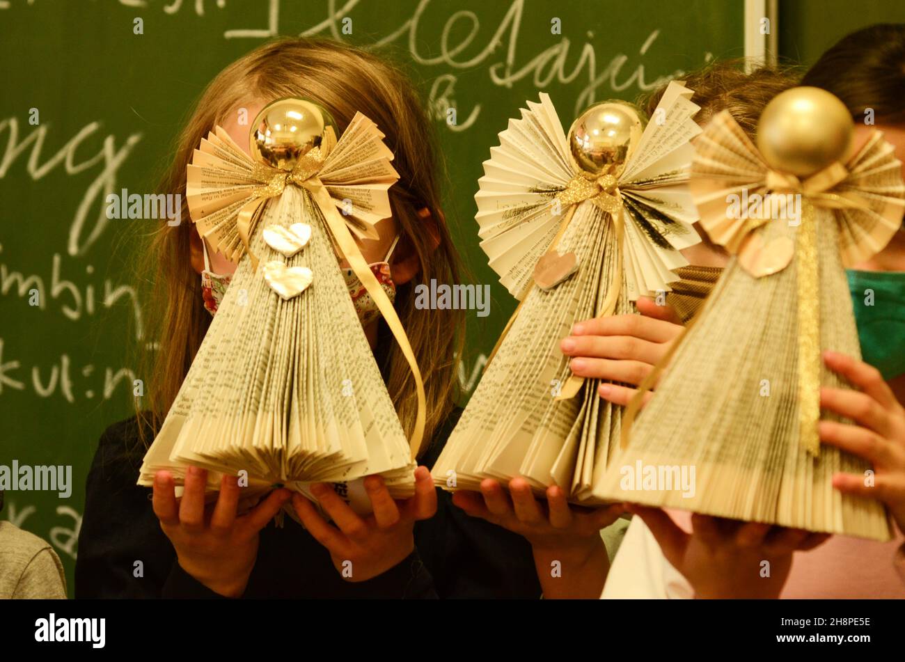 children at school, pupils in the classroom, made angels , angel from ...