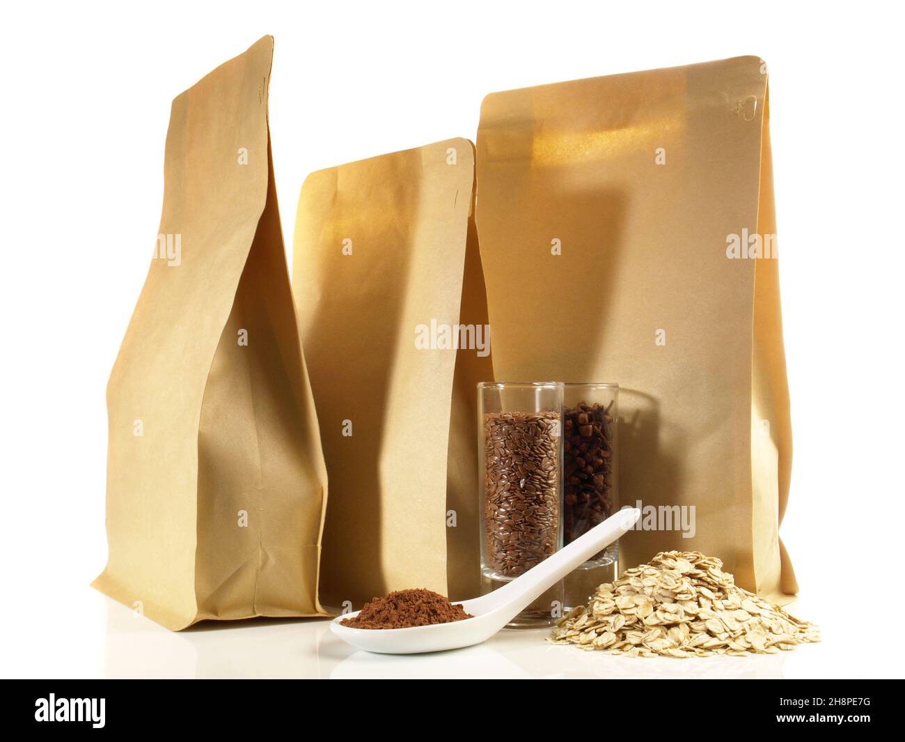 Different size paper bags with foods and nutrients isolated on white ...