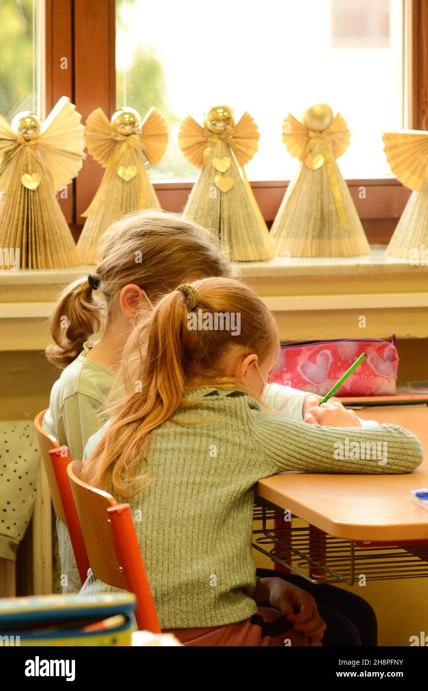 children at school, pupils in the classroom, made angels , angel from ...