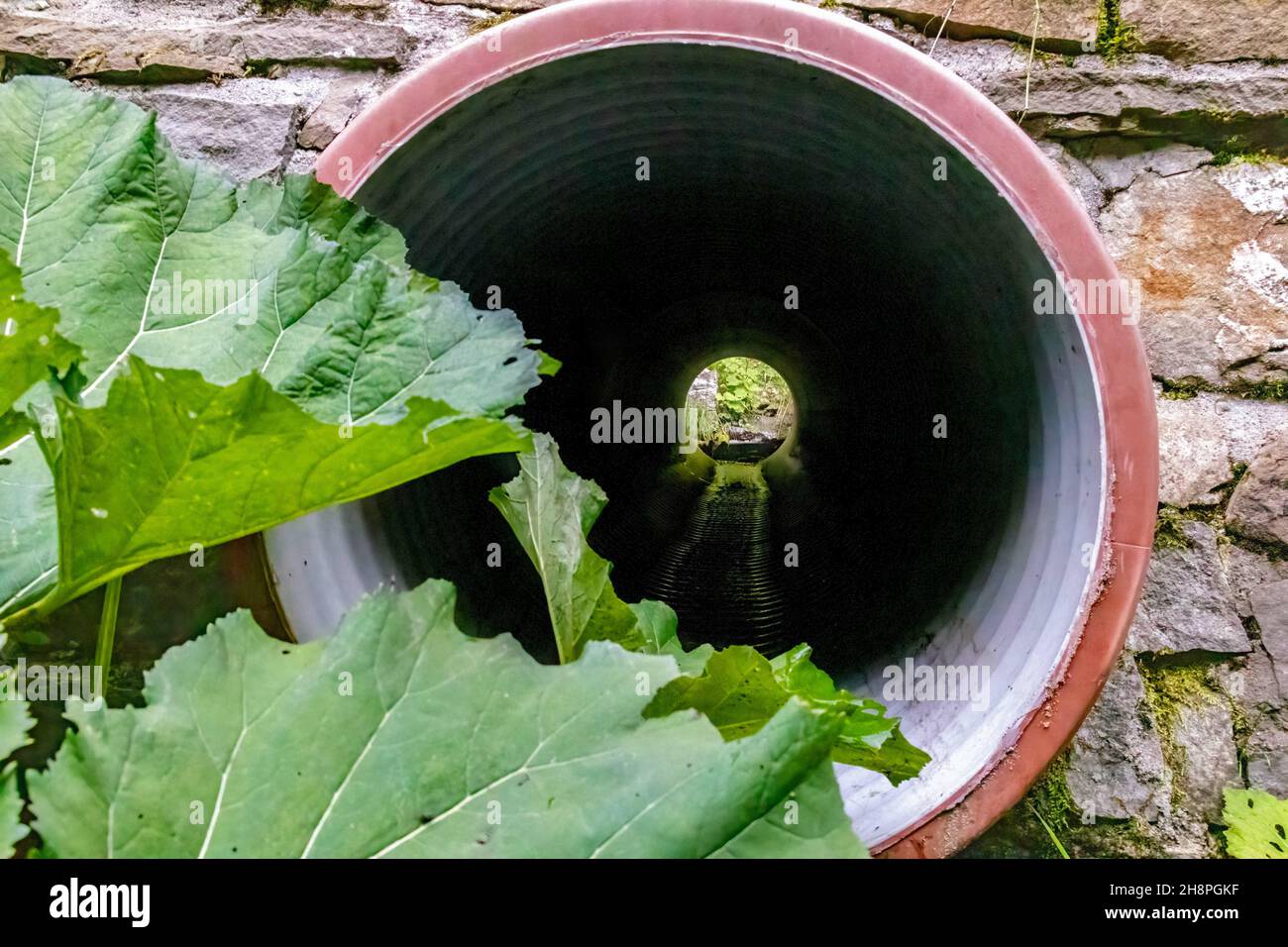 Pipe through wall hi-res stock photography and images - Alamy