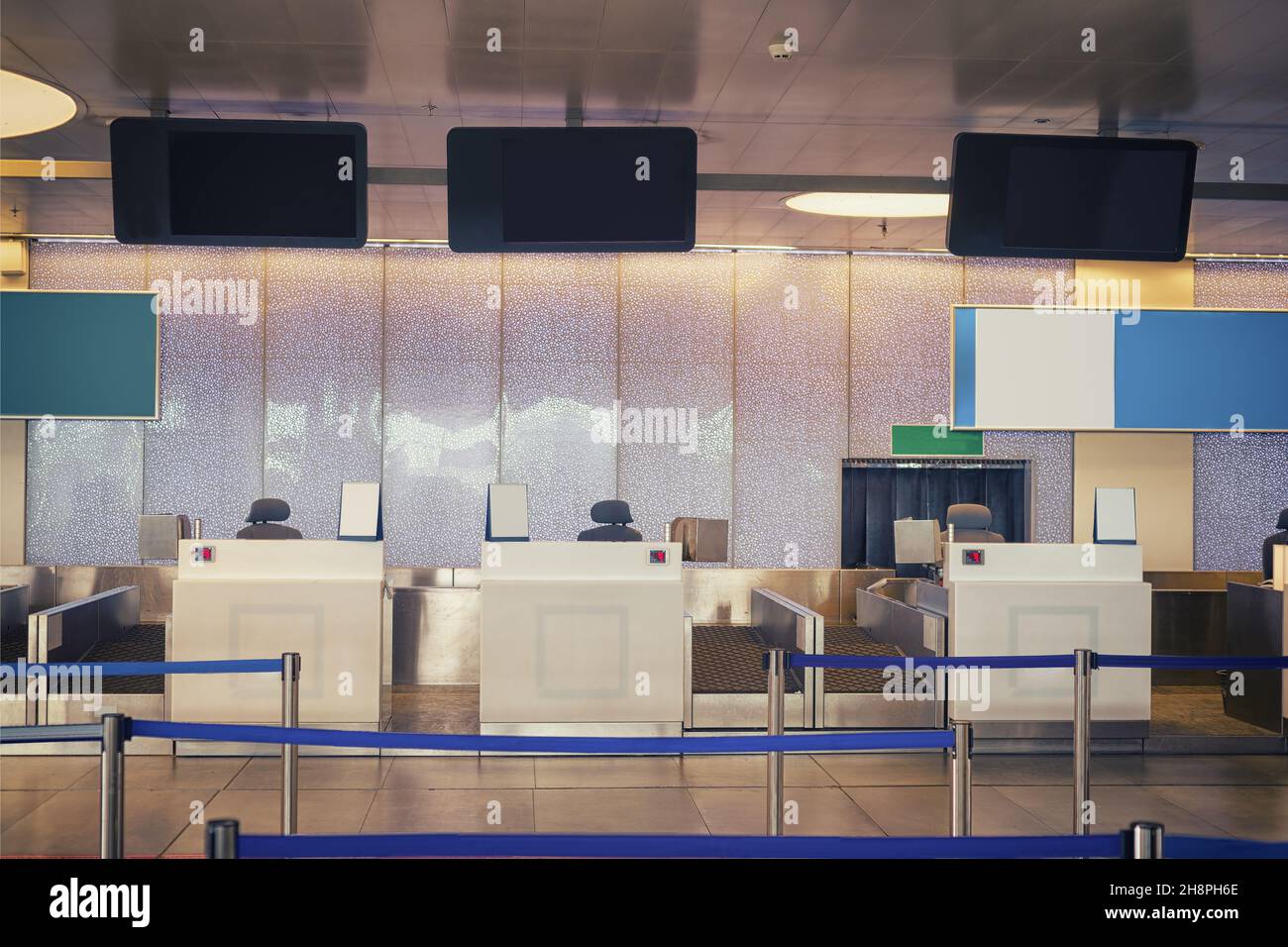 Empty check-in counters at the airport. Check-in counters without ...