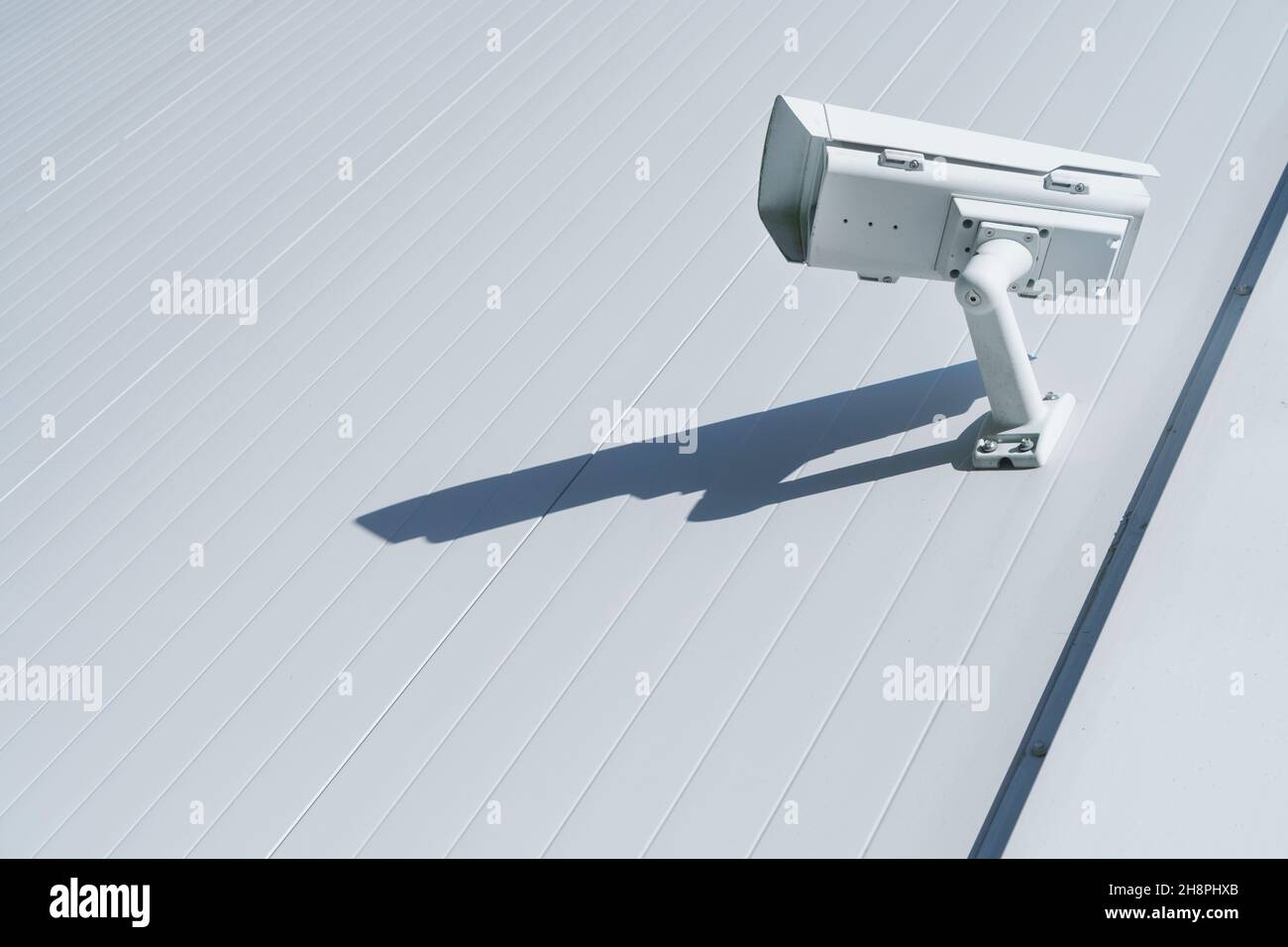 CCTV camera on the wall of the building for monitoring and protection ...