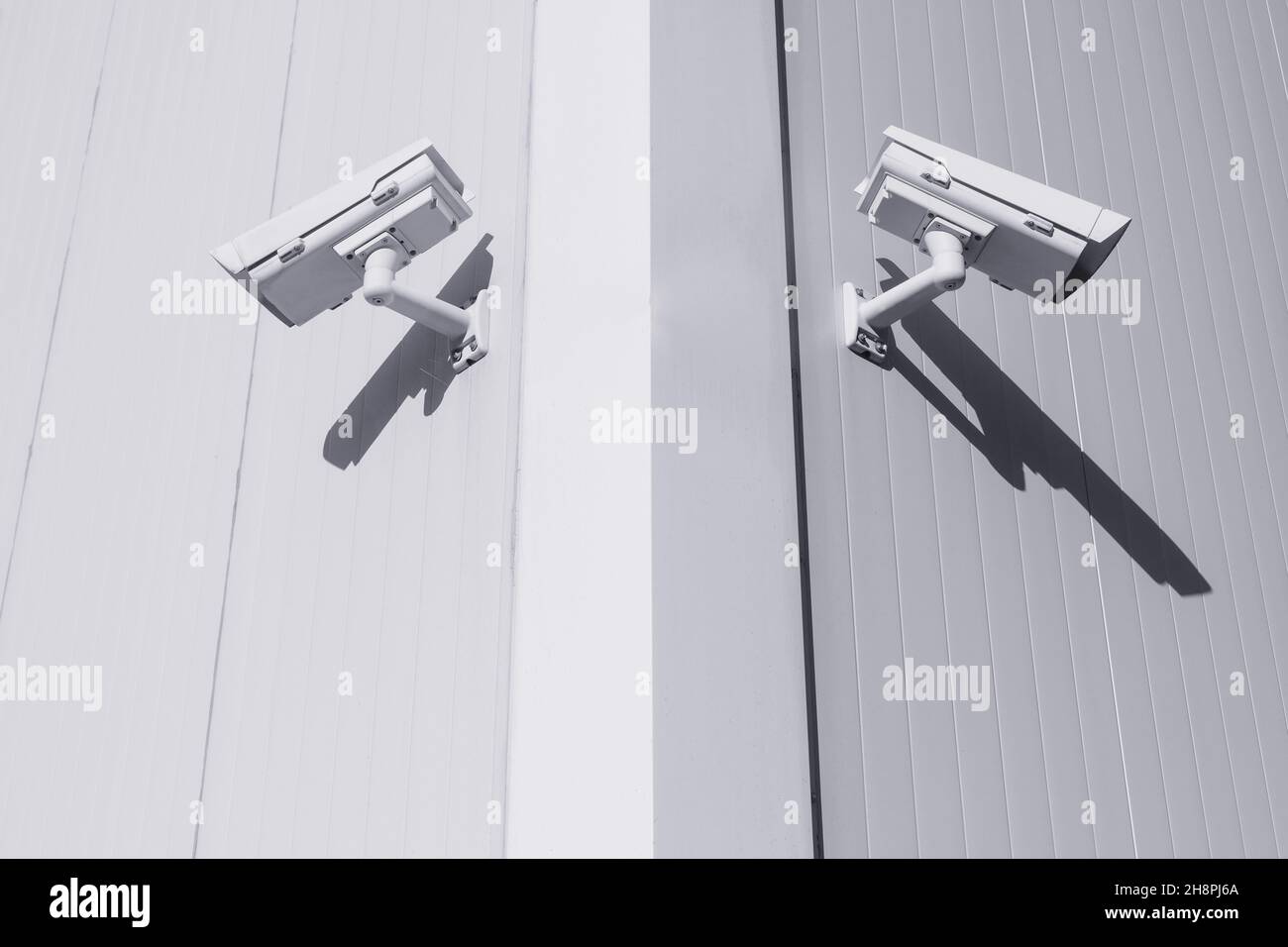 CCTV camera on the wall of the building for monitoring and protection ...