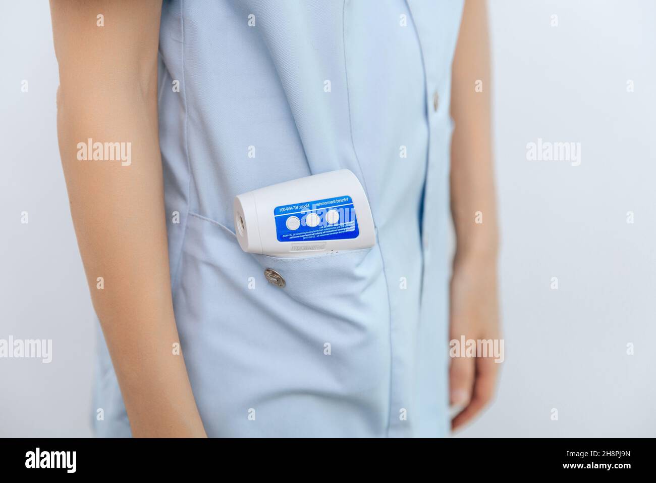 Temperature measurement gun in doctor hands. Close-up shot of doctor ...