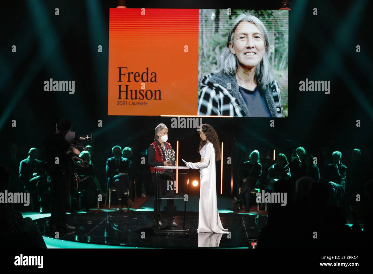 Laureate Freda Huson, Canada, with presenter Gina Dirawi, at the 2021 ...