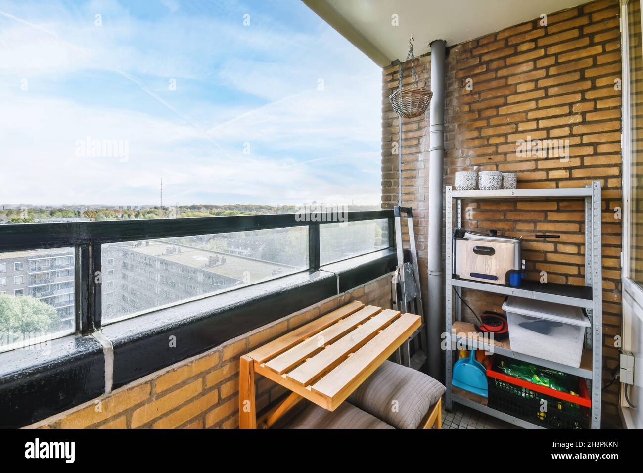 Attractive balcony with wooden bench and stunning views Stock Photo - Alamy