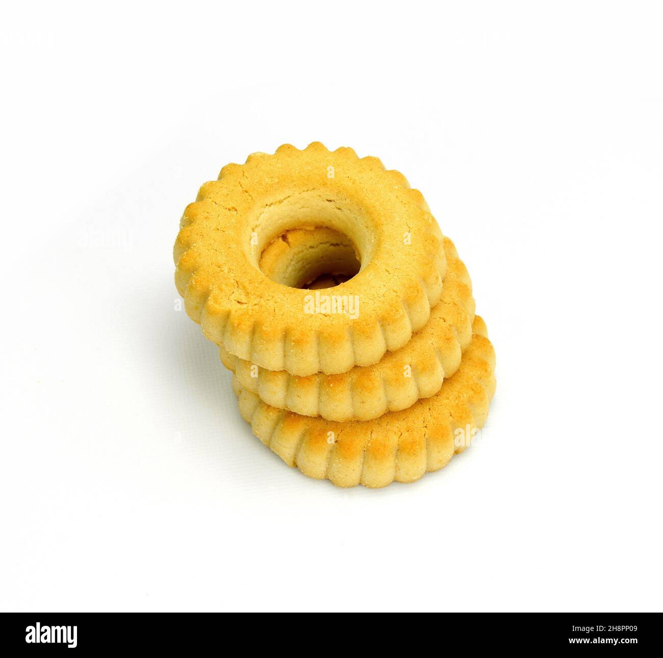 Ring biscuits pile isolated on a white background Stock Photo - Alamy