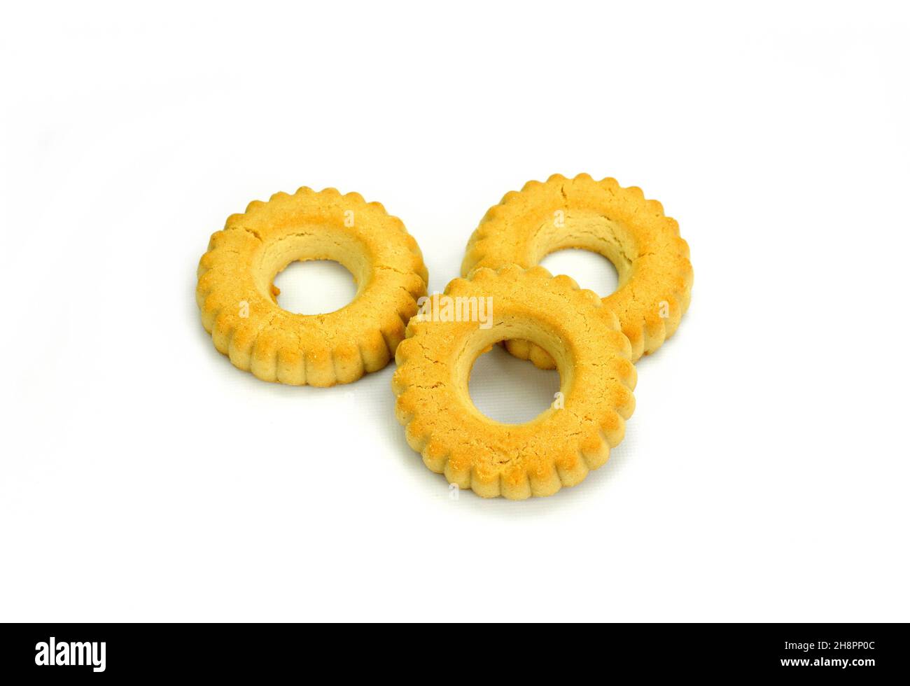 Ring biscuits pile isolated on a white background Stock Photo - Alamy