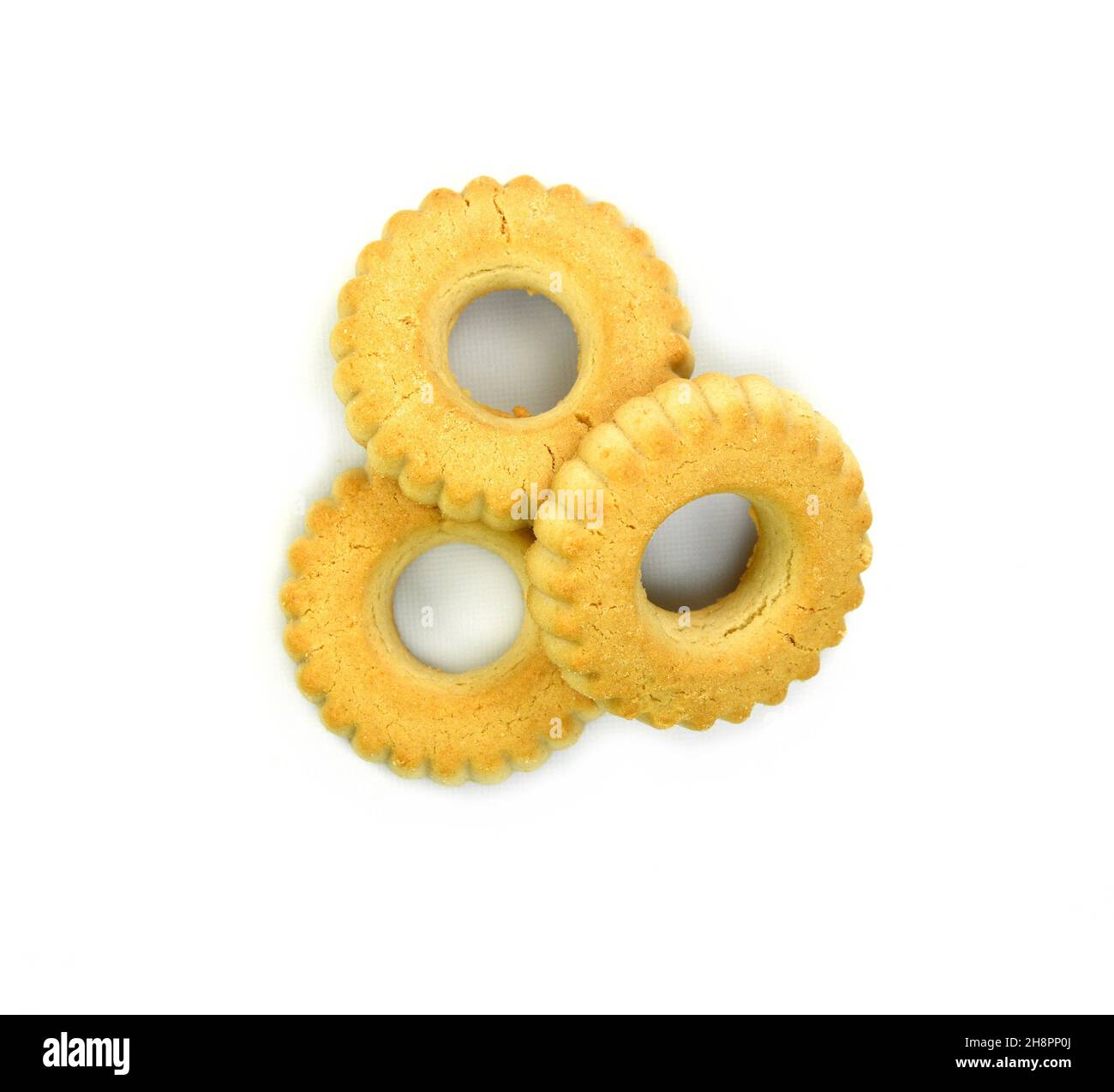 Ring biscuits pile isolated on a white background Stock Photo - Alamy