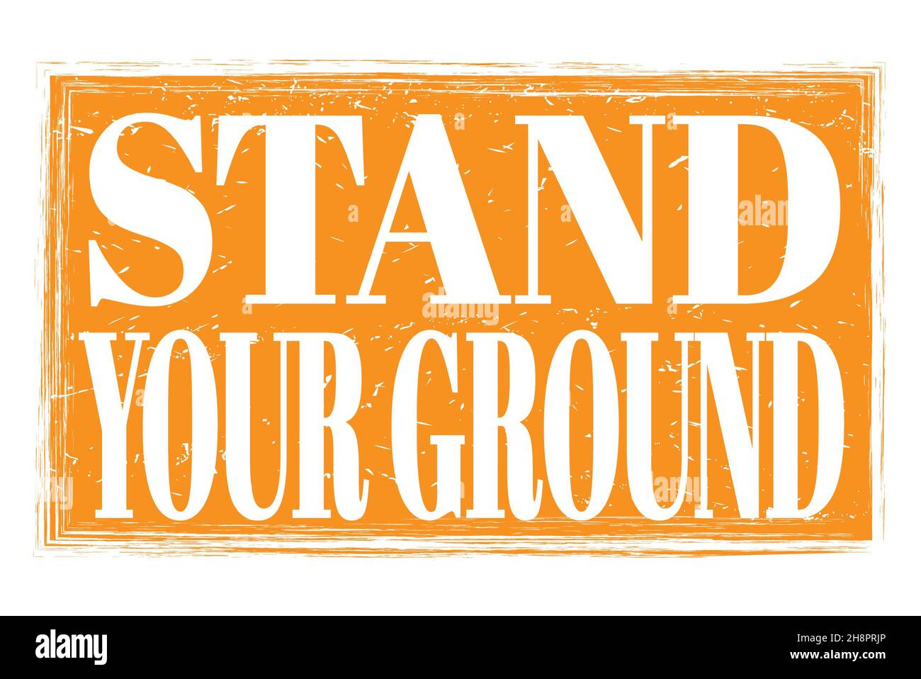 STAND YOUR GROUND, words written on orange grungy stamp sign Stock ...