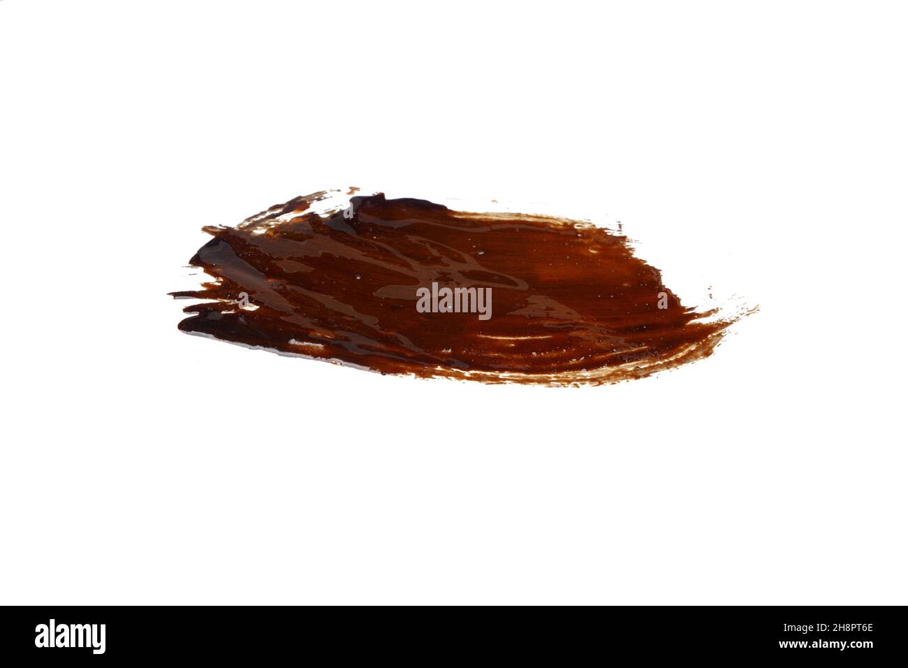 Liquid tar puddle isolated on white background Stock Photo - Alamy