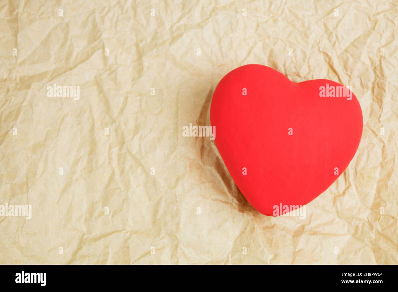 The red heart shape paper on brown hi-res stock photography and images ...
