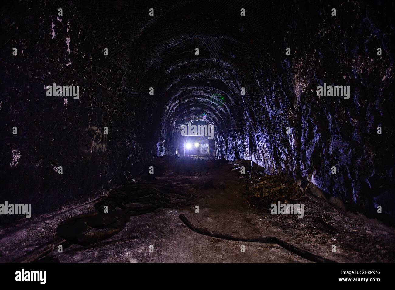 Dark creepy abandoned coal mine in backlight Stock Photo - Alamy