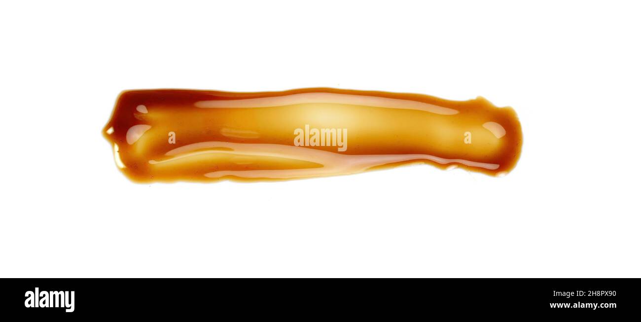 Pomegranate sauce dressing isolated on white. Pomegranate syrup puddle ...