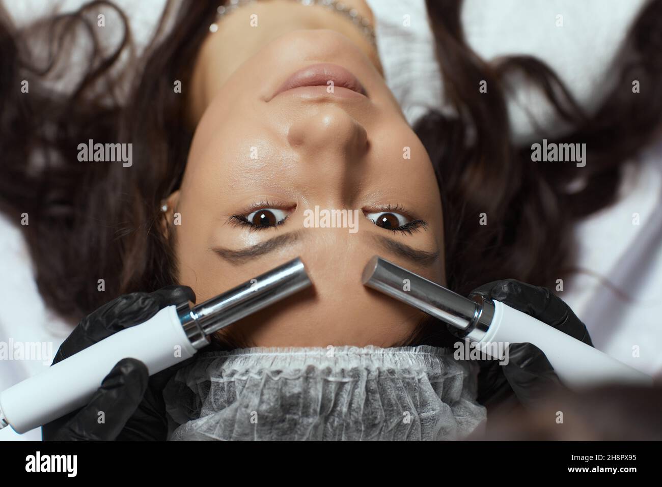 Cosmetology. Beautiful Woman At Spa Clinic Receiving Stimulating ...