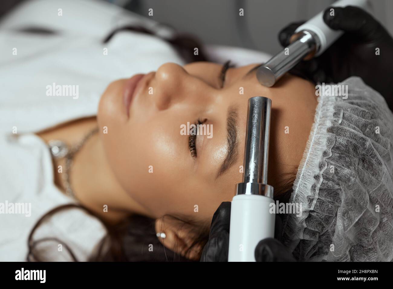 Cosmetology. Beautiful Woman At Spa Clinic Receiving Stimulating ...
