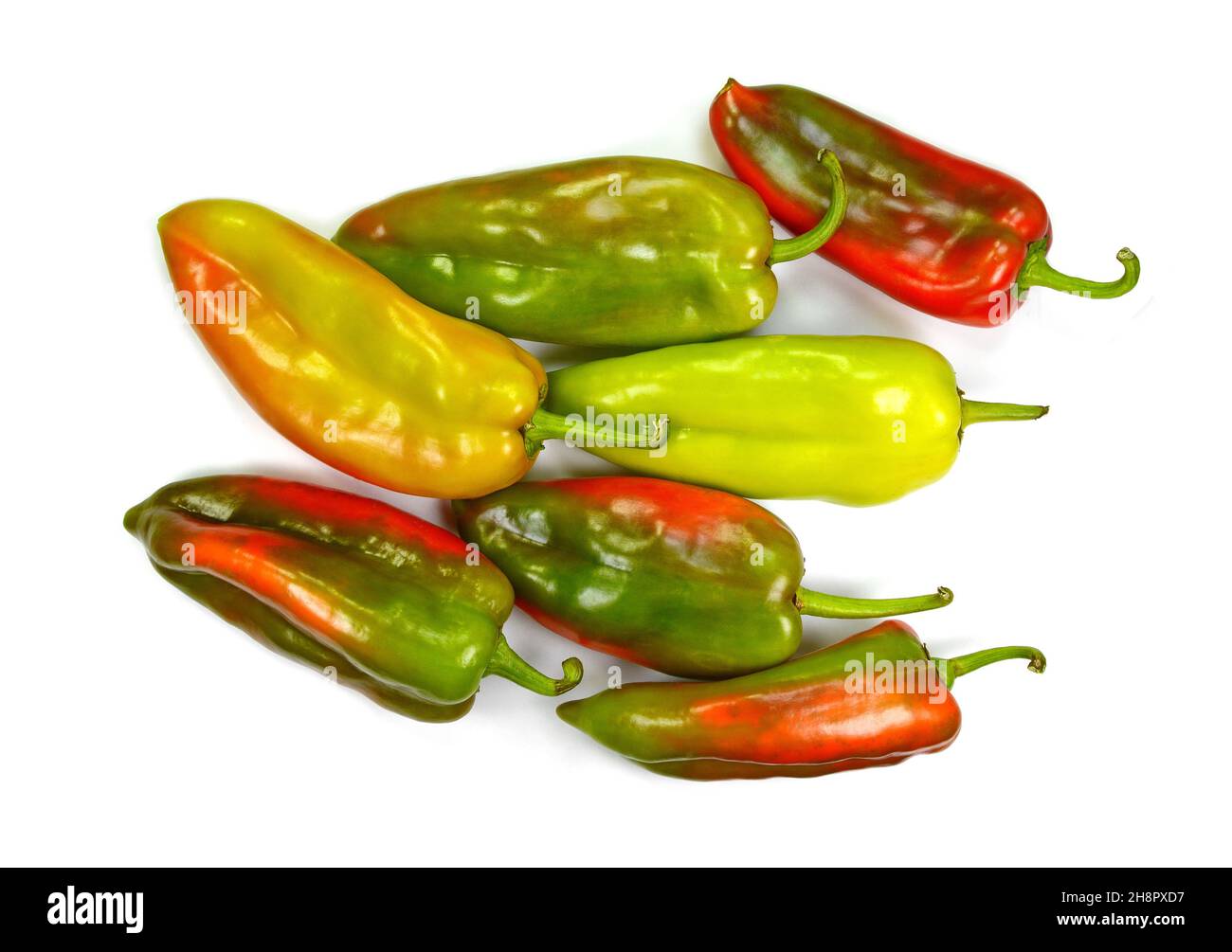 Different colored paprikas isolated on white background Stock Photo - Alamy