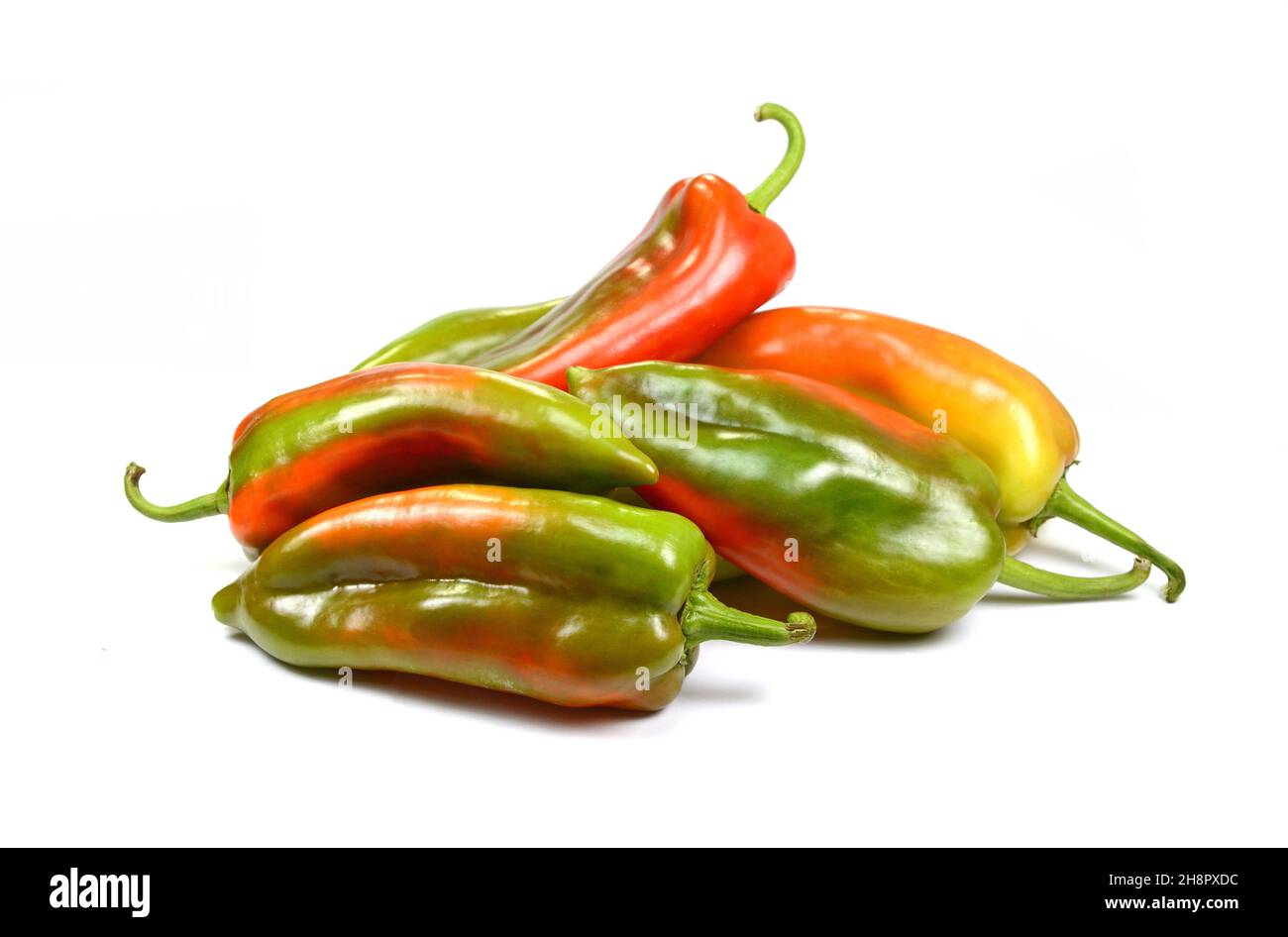 Different colored paprikas isolated on white background Stock Photo - Alamy