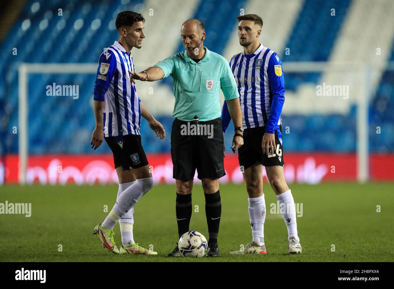 Referee Andy Haines awards a free kick to Sheffield Wednesday just ...