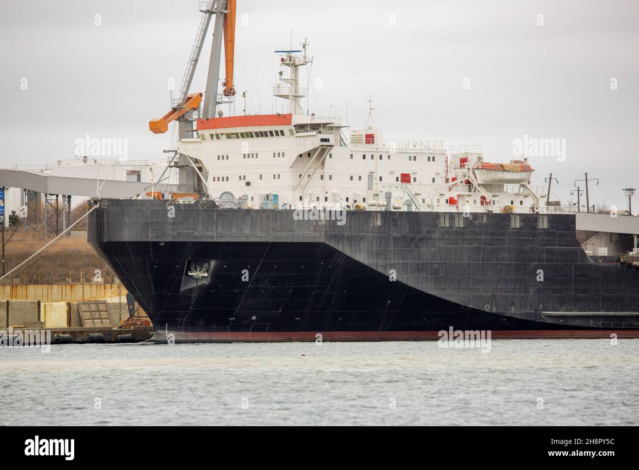 Part of RORO ship close up in port at on ferry. ferryboat terminal on ...