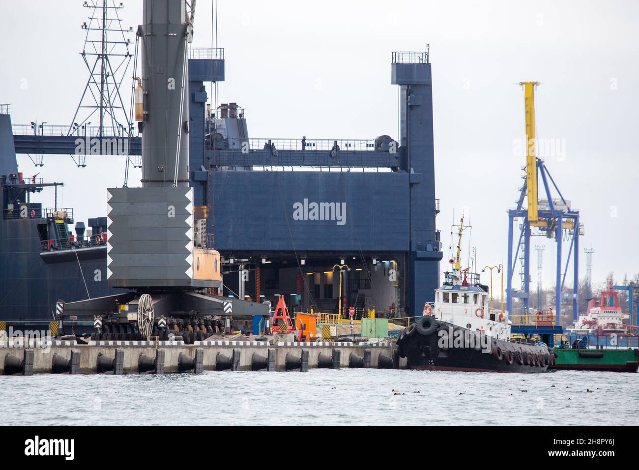 RORO ship in port at on ferry. ferryboat terminal on loading, unloading ...