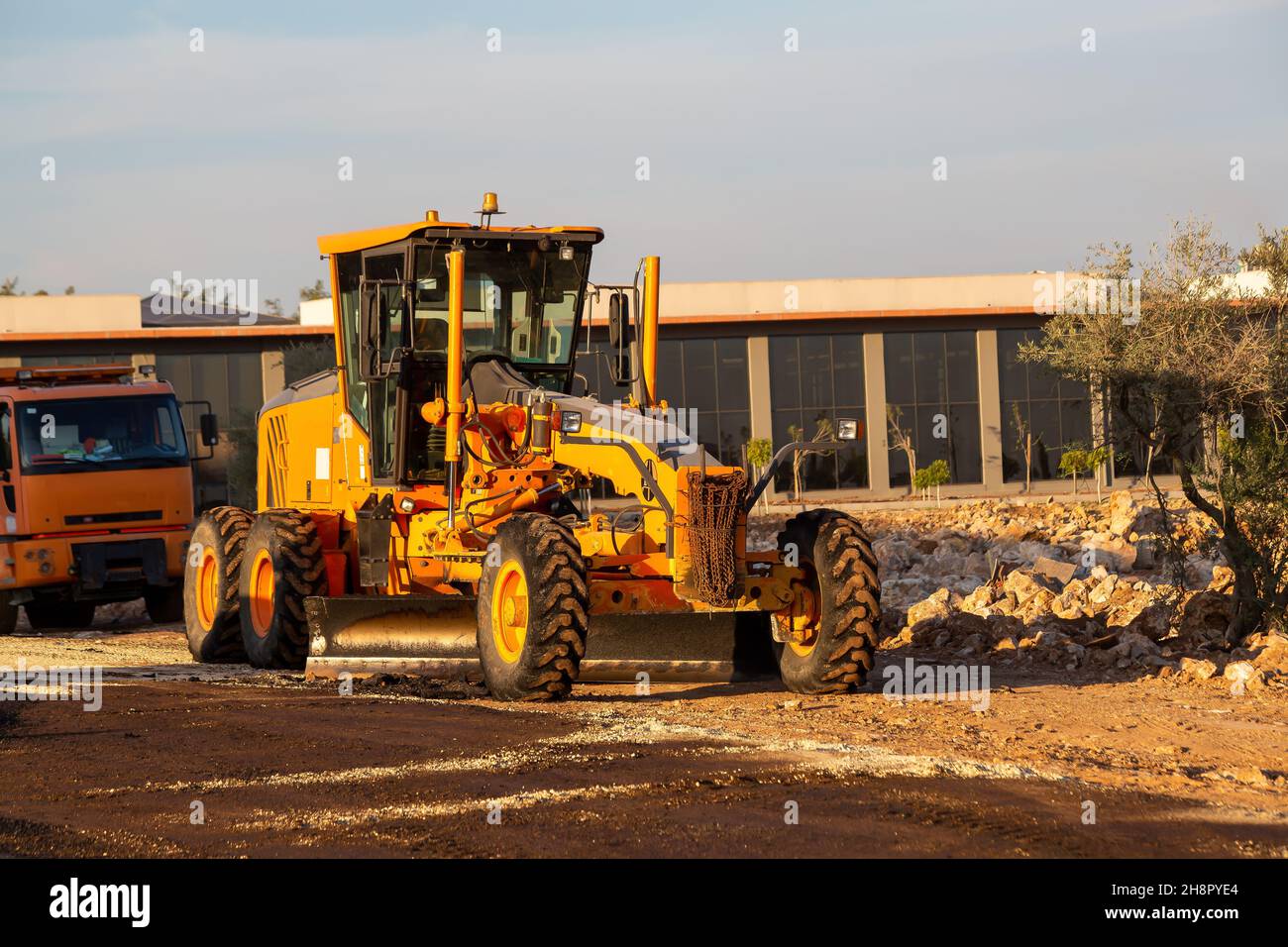big heavy machinery in yellow color Stock Photo - Alamy