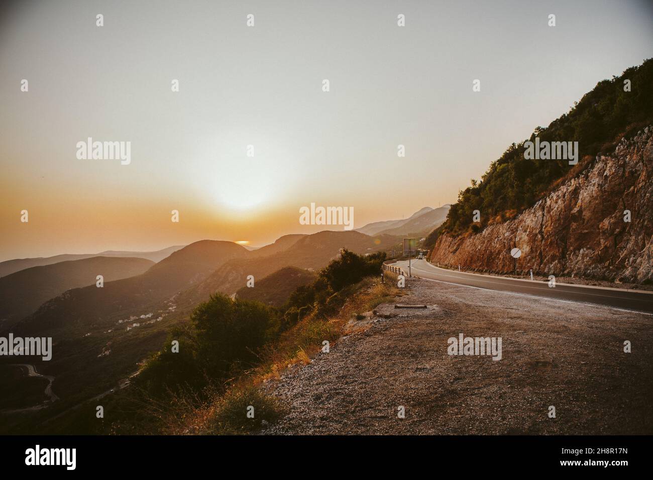 Road on the mountain on the sunset Stock Photo - Alamy