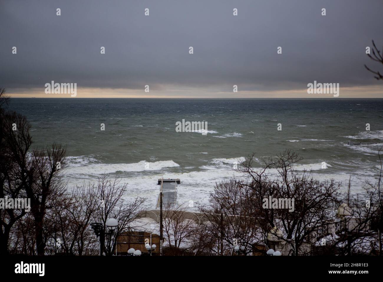 winter seascape during a storm. storm on shore in winter. strong storm ...