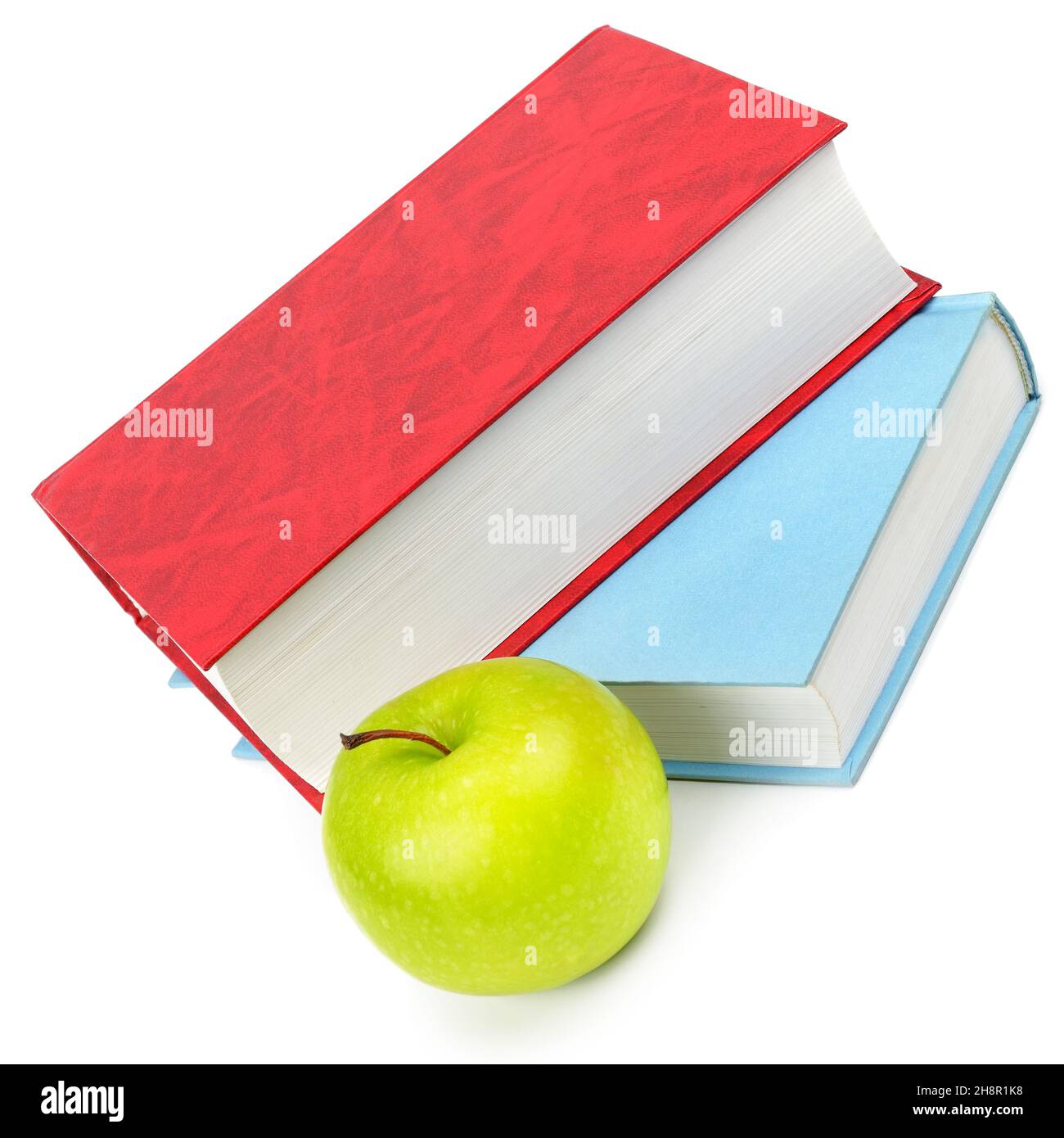 Books and apple isolated on white background Stock Photo - Alamy