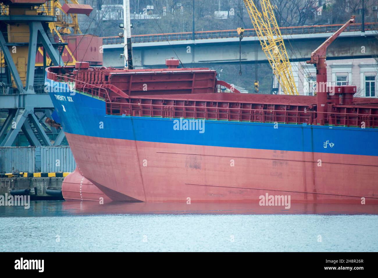 Vessel dry cargo on loading, unloading in port. Bulker in port Stock ...