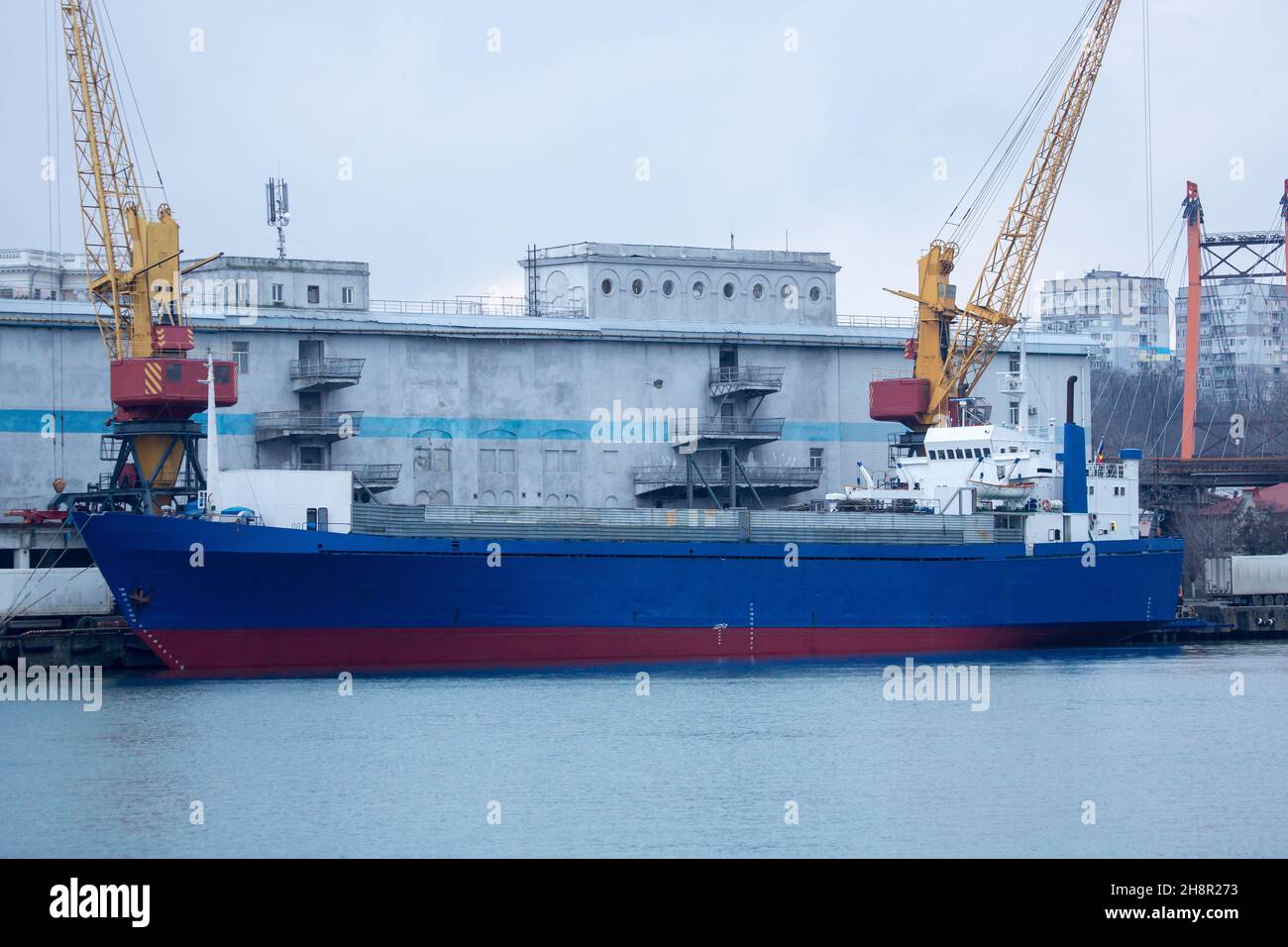 Vessel dry cargo on loading, unloading in port. Bulker in port Stock ...